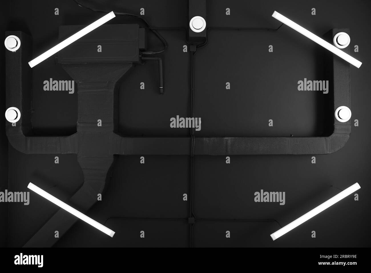 Black ceiling with modern lighting in room, bottom view Stock Photo - Alamy