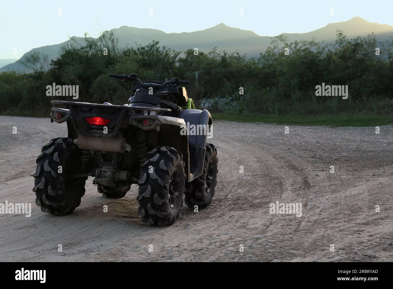 Modern fast quad bike on pathway outdoors Stock Photo - Alamy