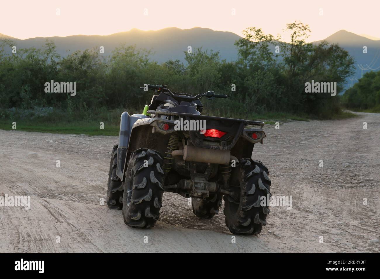 Modern fast quad bike on pathway outdoors Stock Photo - Alamy