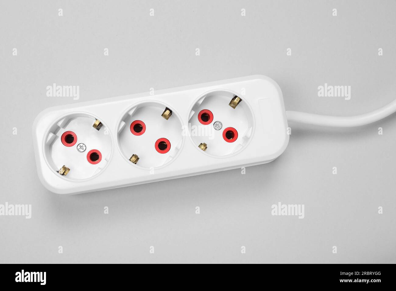 Power strip on white background, top view Stock Photo - Alamy
