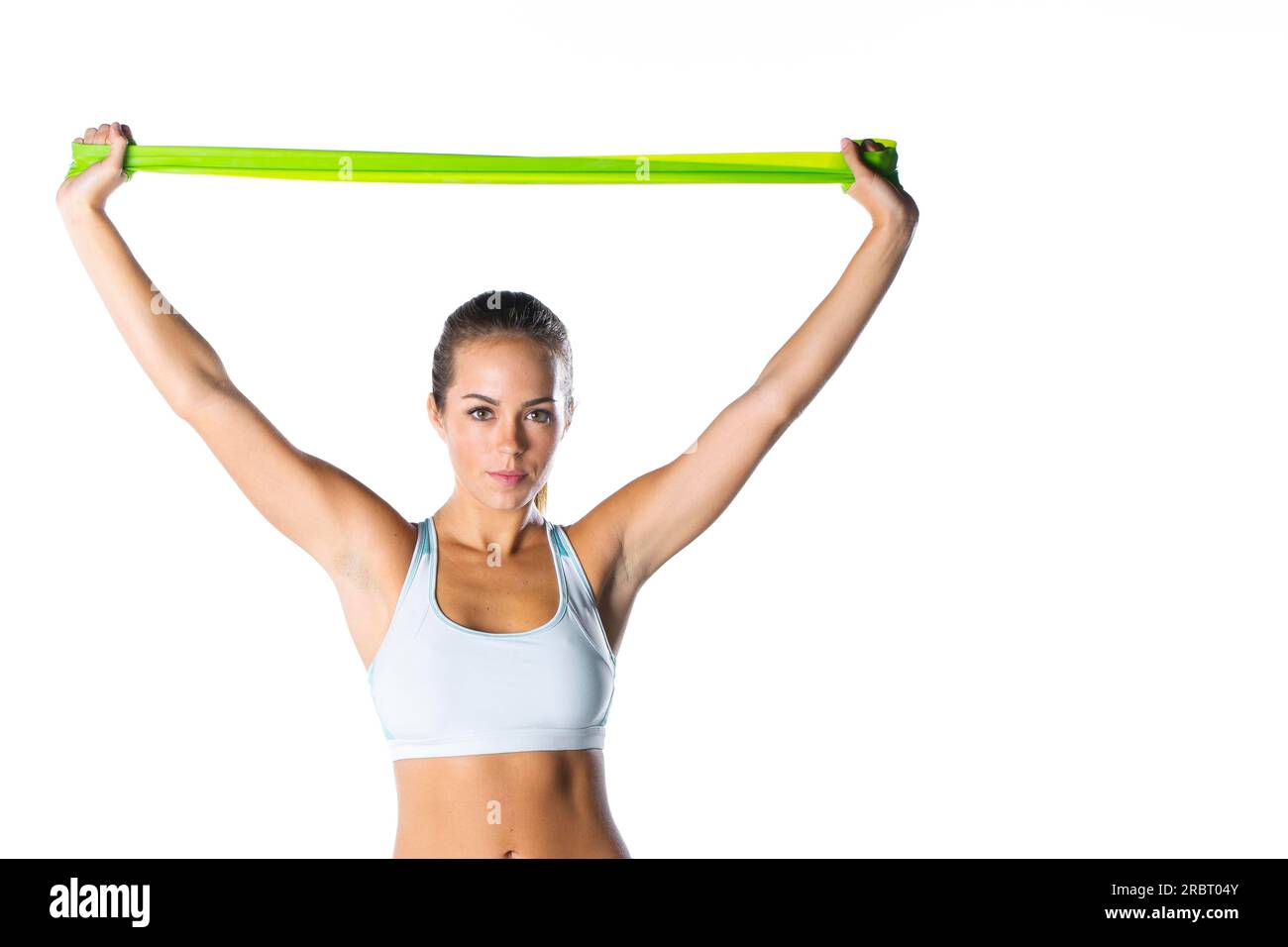 A brunette fitness model preparing to work out Stock Photo - Alamy