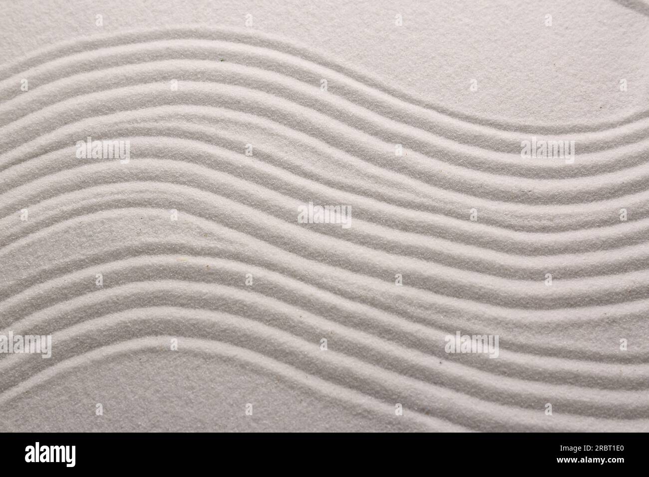White sand with pattern as background, top view. Concept of zen and ...