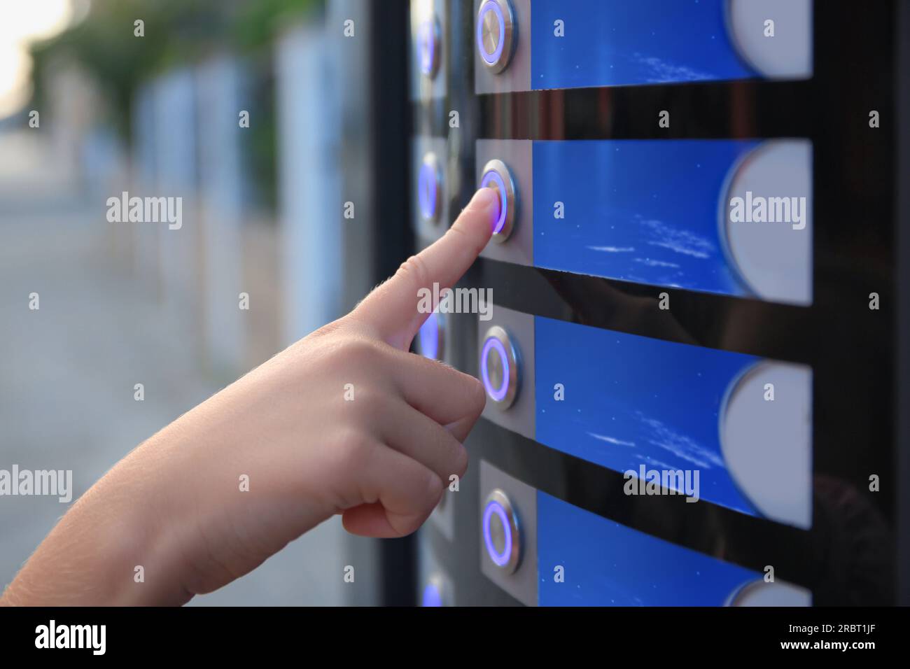 Using coffee vending machine. Woman pressing button to choose drink ...