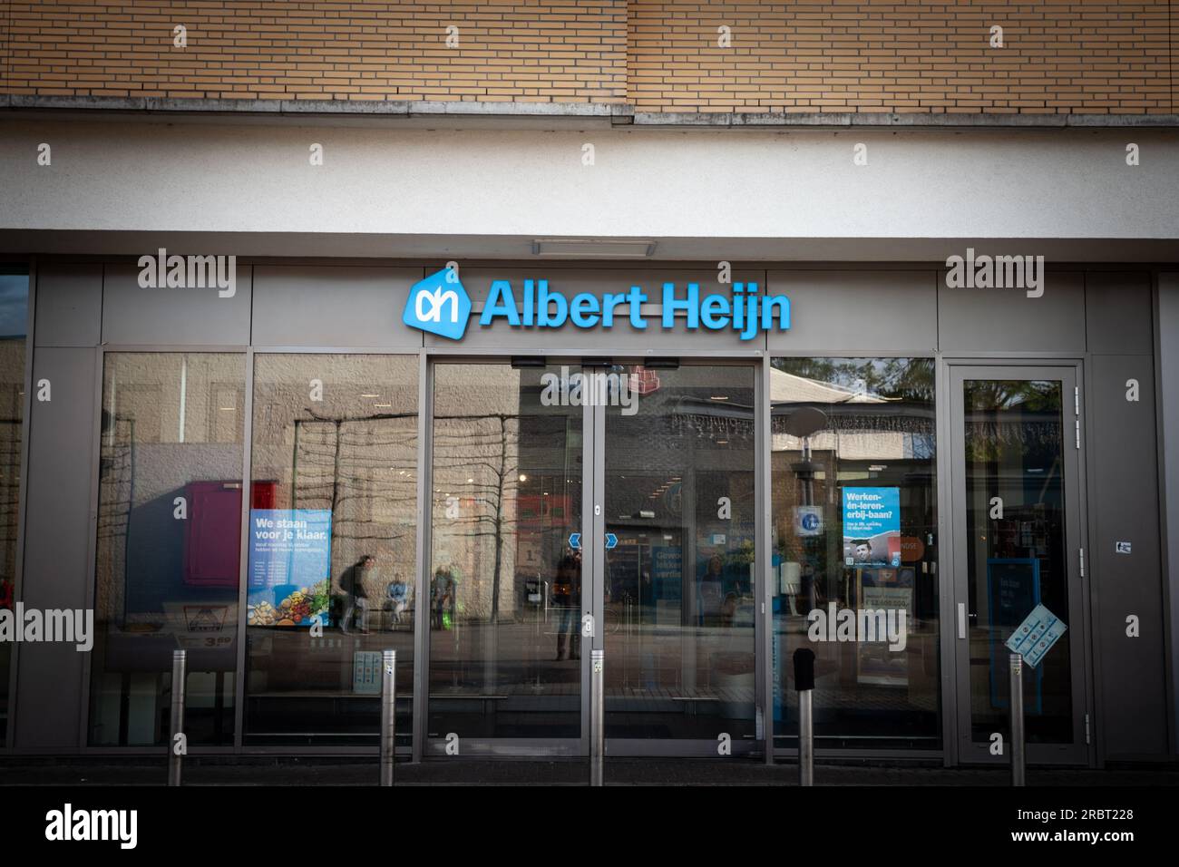 Picture of a sign with the logo of Albert Heijn on their main ...