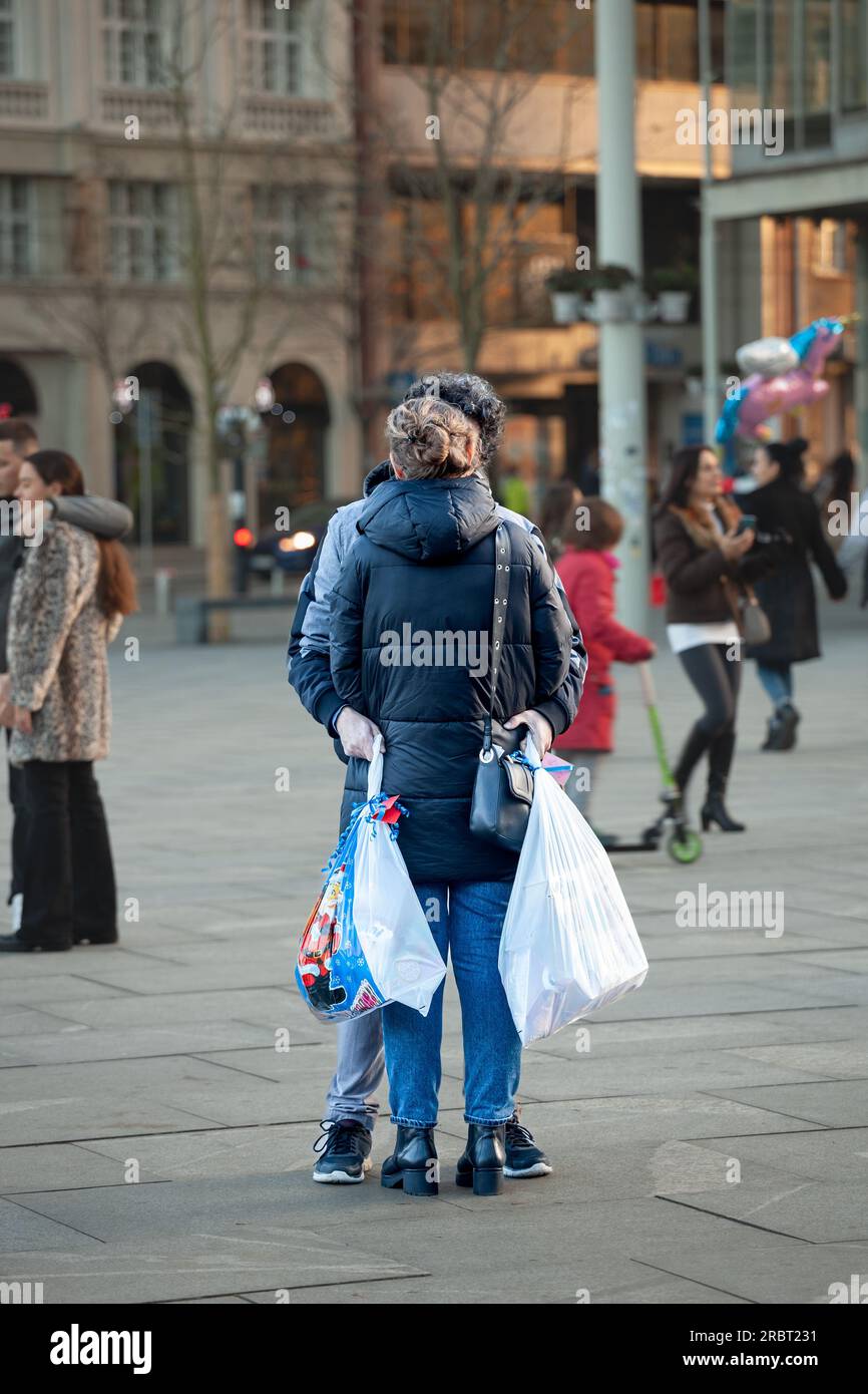 Person carrying grocery bags hi-res stock photography and images - Alamy