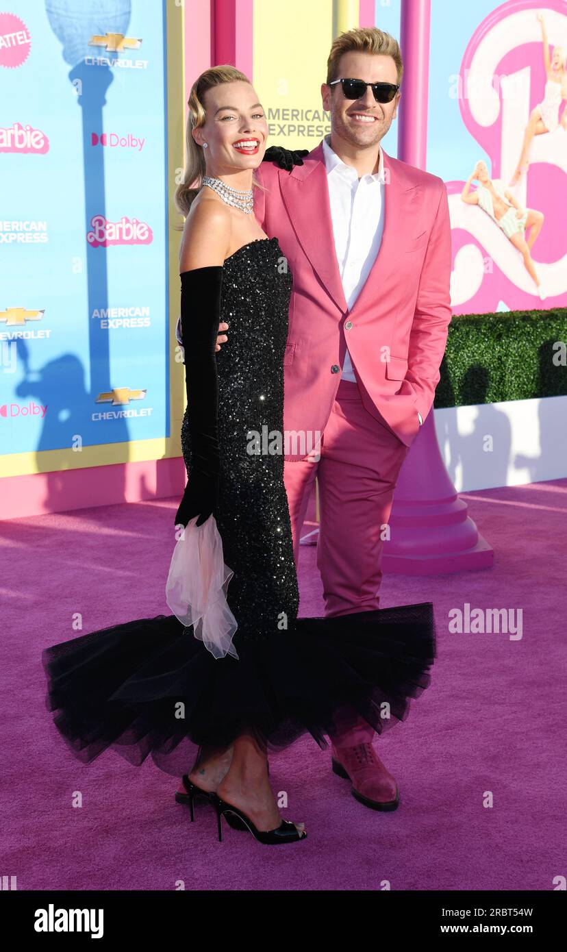 LOS ANGELES, CALIFORNIA - JULY 09: Margot Robbie, Scott Evans attends ...
