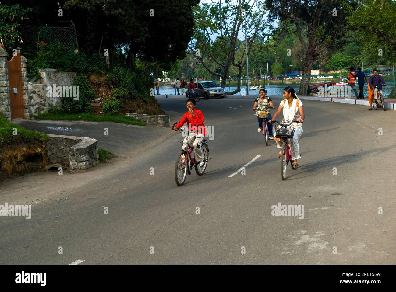 Riding bicycle around the lake road at Kodaikanal, Tamil Nadu, South ...