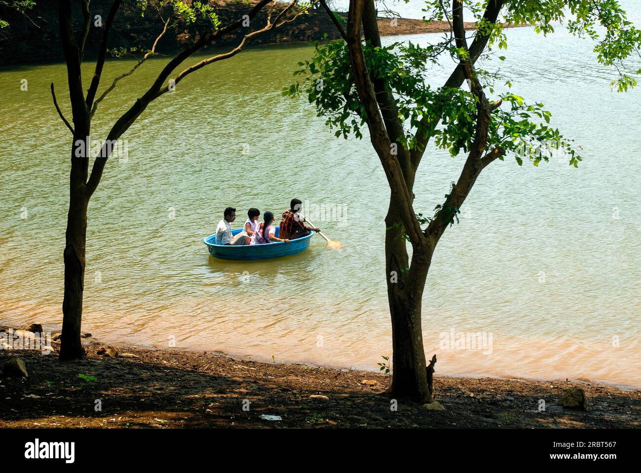 Tourists enjoying coracle ride at Baralikkadu eco tourist spot is ...