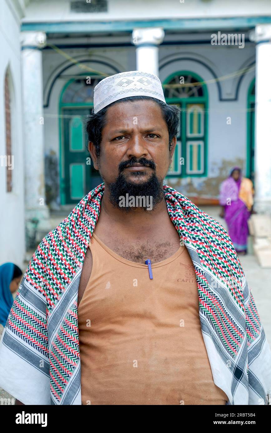 A Muslim man standing in front of Hazrat Abdus Sabir Maulana Dargah ...