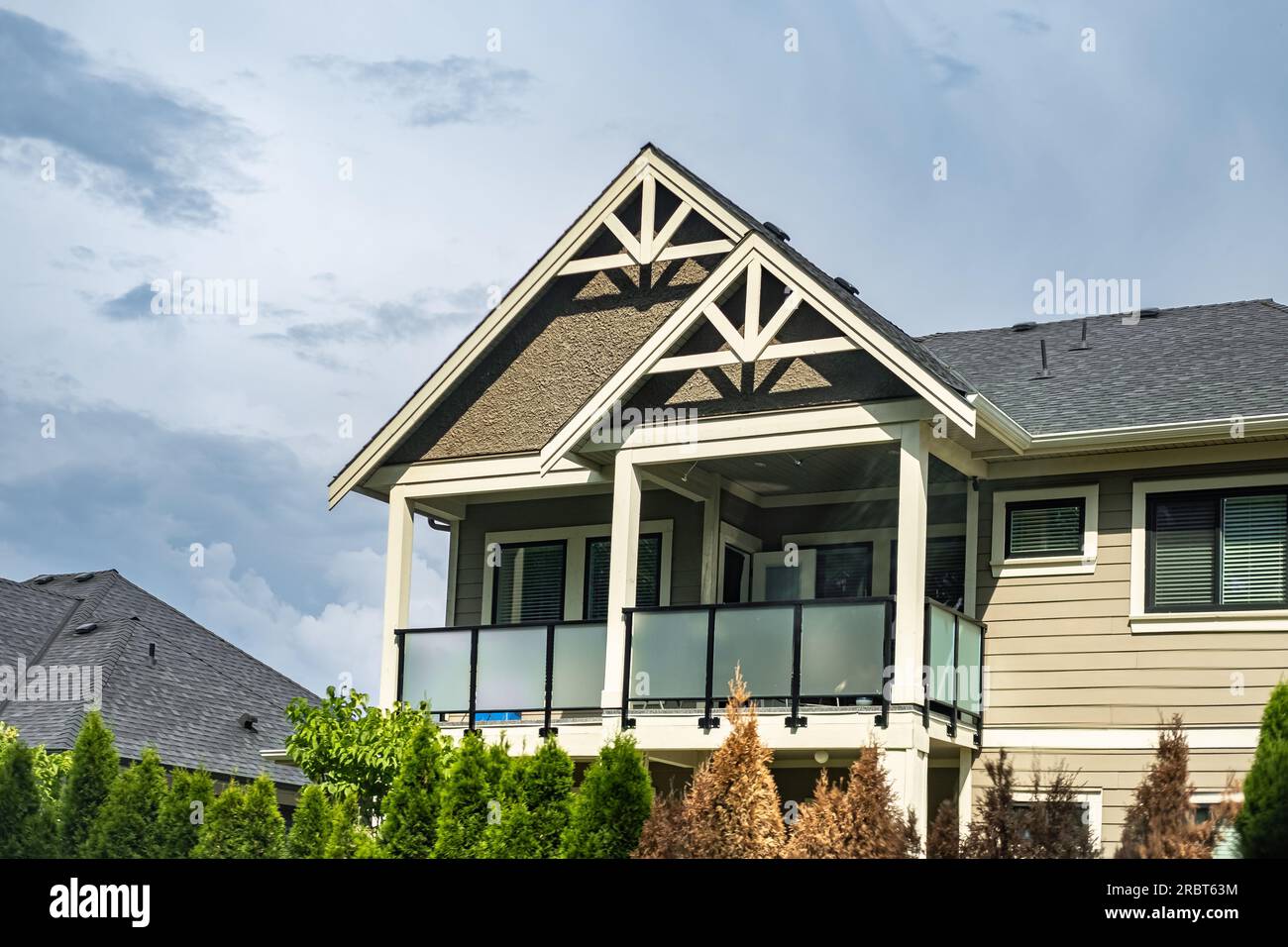 Facade of new residential townhouses. Top of a modern buildings with ...