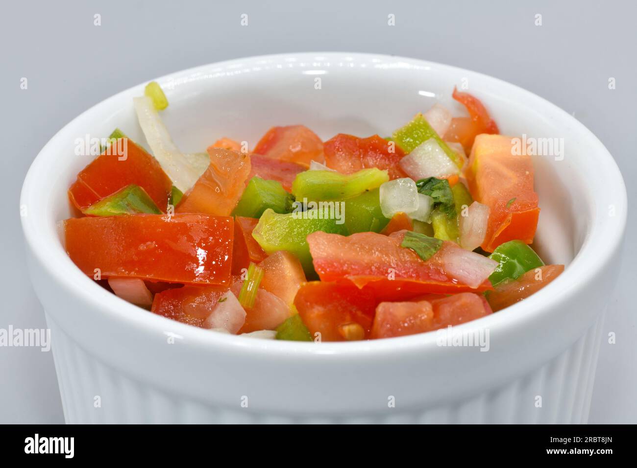 Salsa mix in a small white dish Stock Photo - Alamy