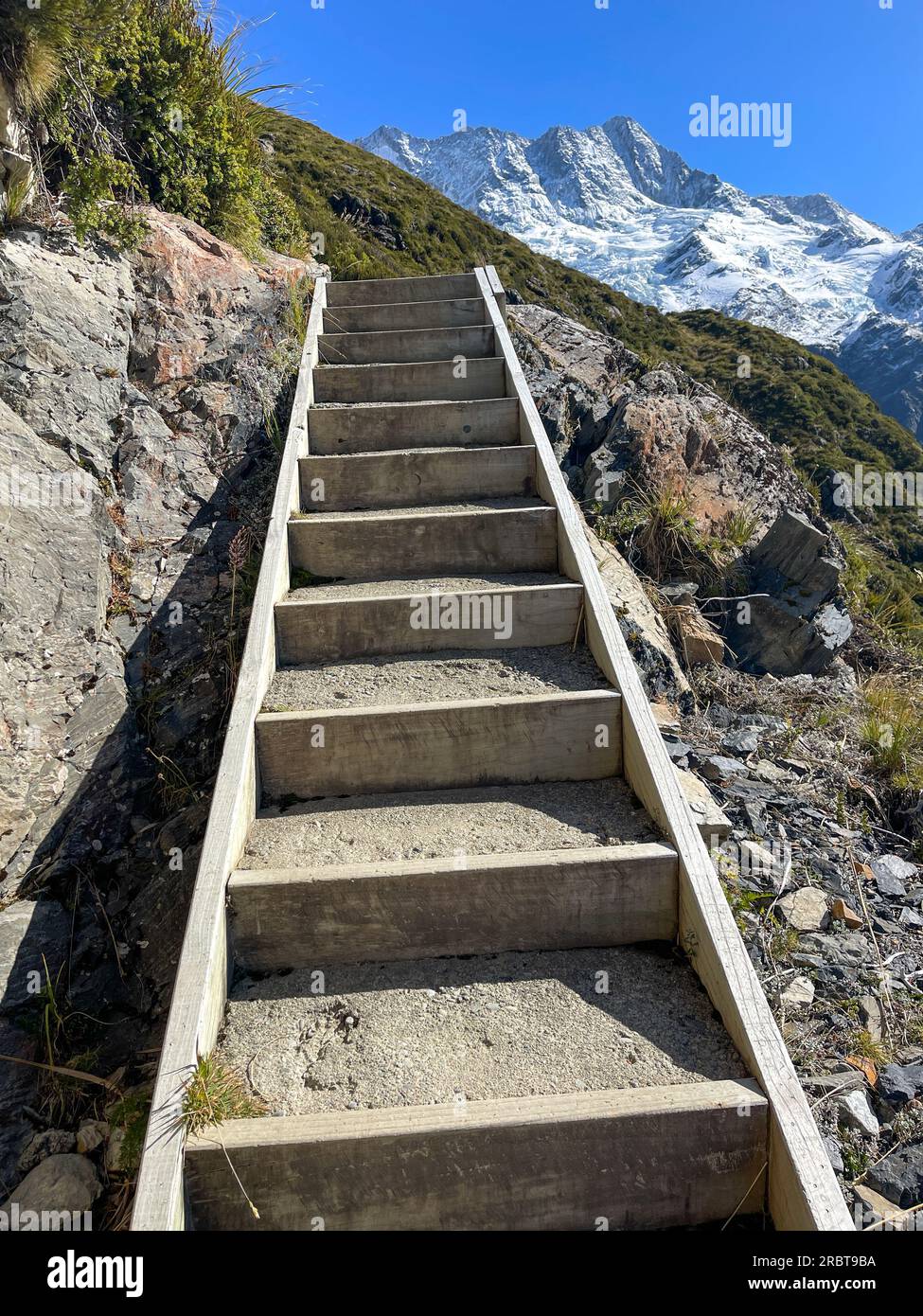 The steps and stairs climbing up the steep Sealy Tarns track often ...