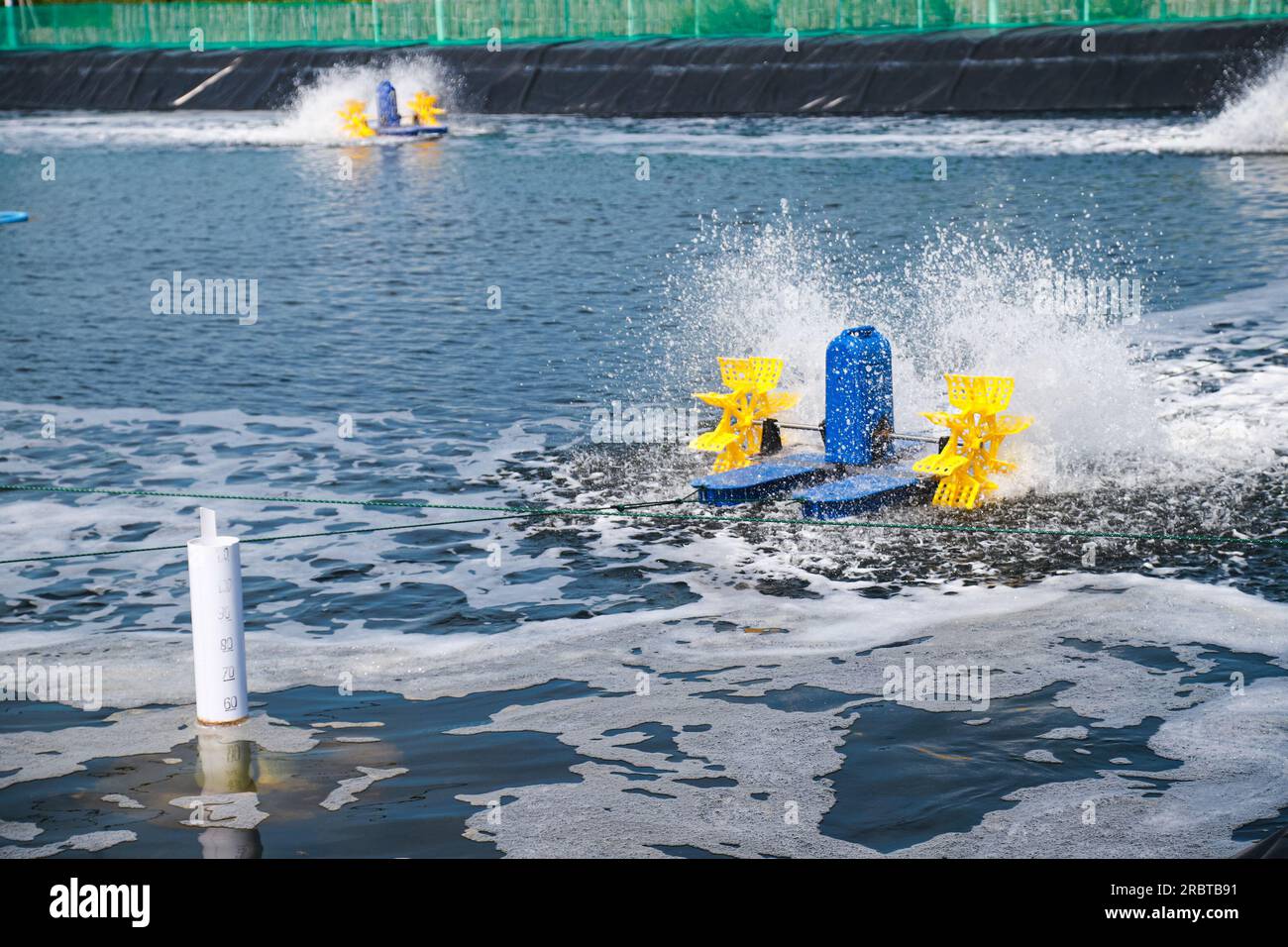 Paddle wheel aerators are used to increase the quality of oxygen in ...