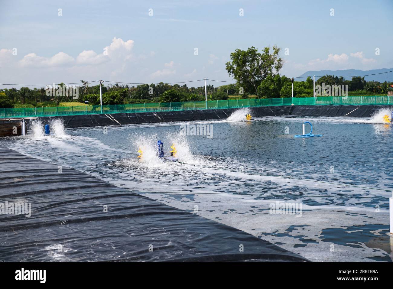 Paddle wheel aerators are used to increase the quality of oxygen in ...