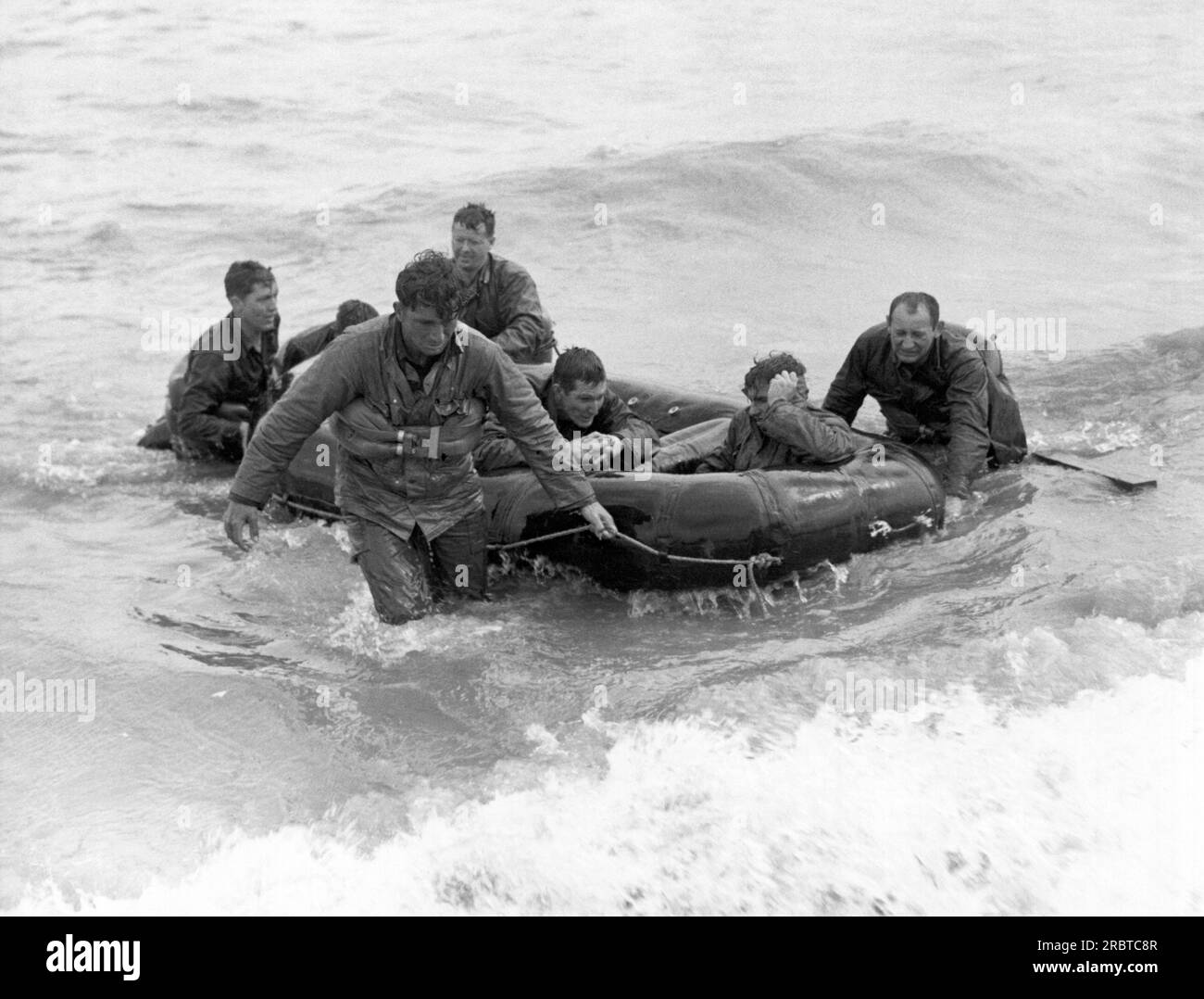 Normandy, France: June 6, 1944 Survivors of a sunk LCVP off the coast ...