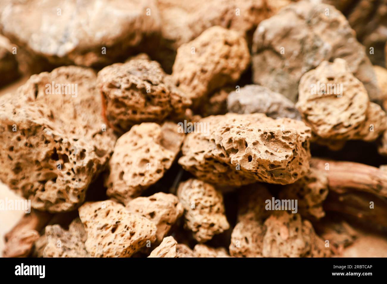 pumice stone and lava stone with lots of pores which are widely used ...