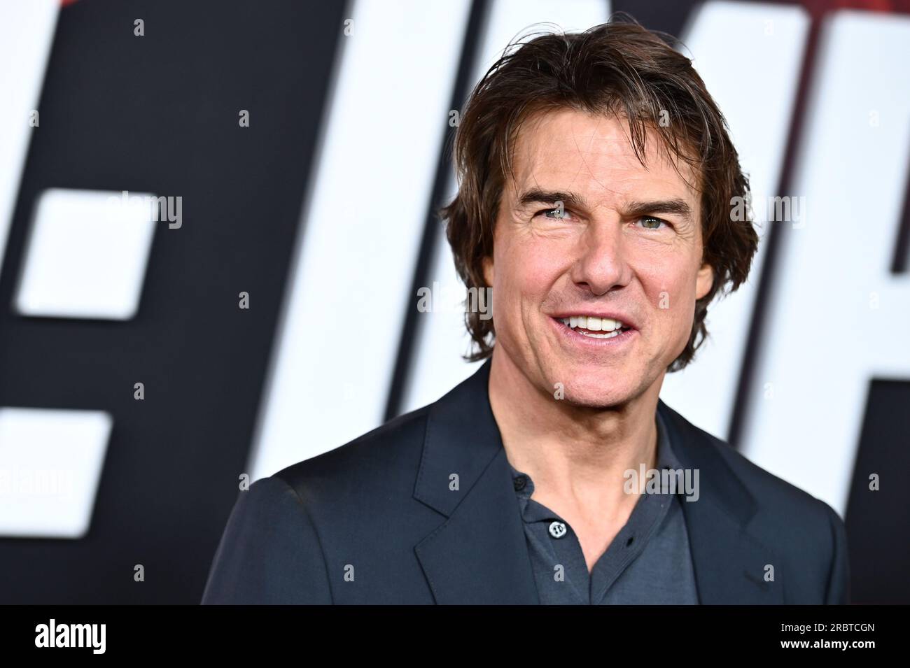 New York, USA. 10th July, 2023. Tom Cruise walks the red carpet as ...
