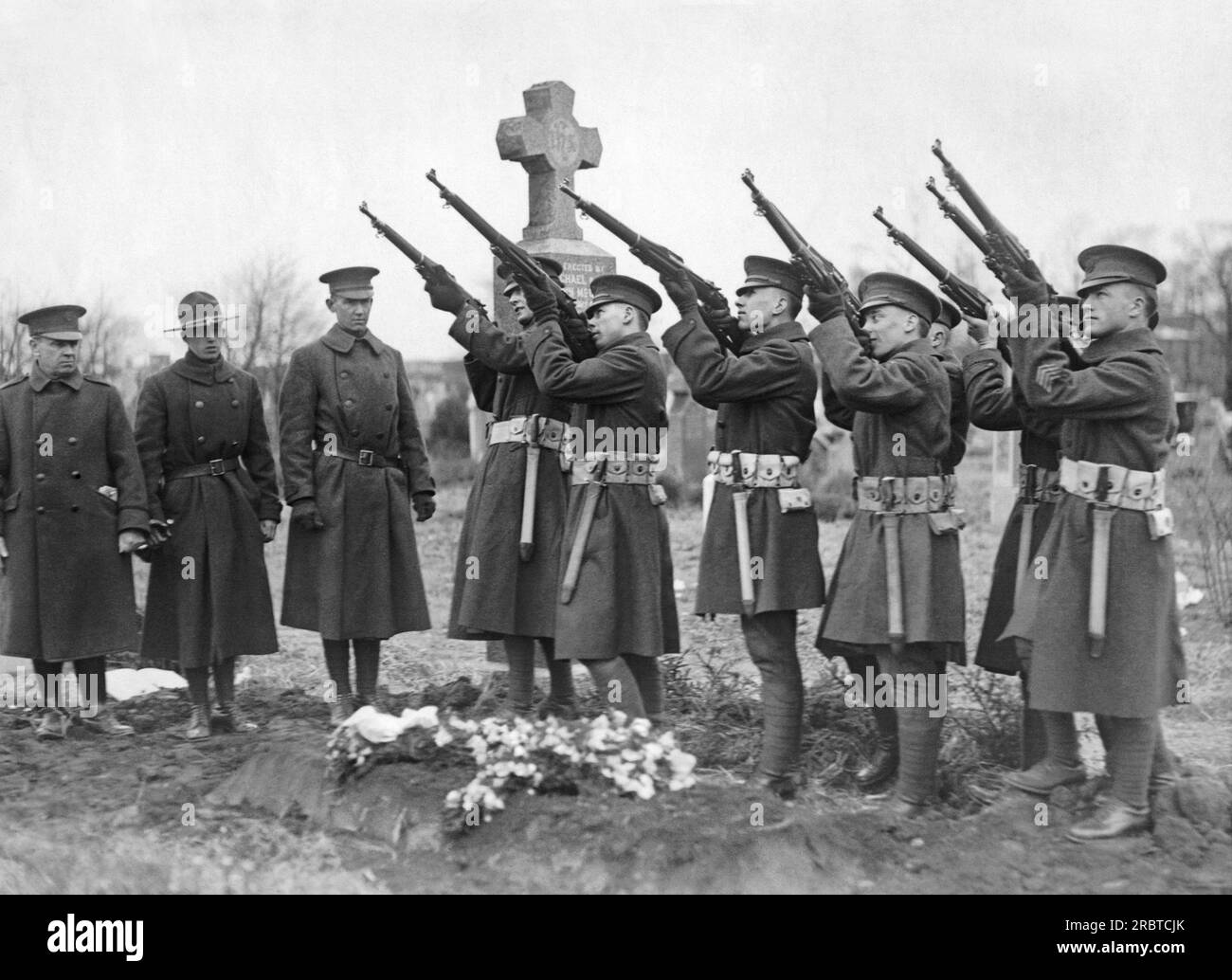 New York, New York: March 19, 1920 A firing squad firing a salute over ...