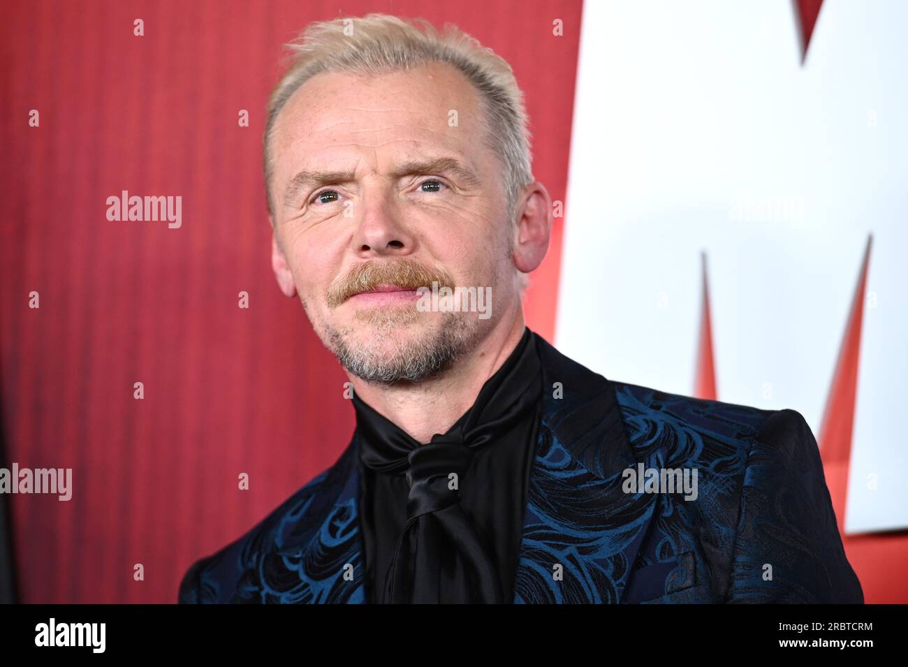 New York, USA. 10th July, 2023. Simon Pegg walks the red carpet as ...