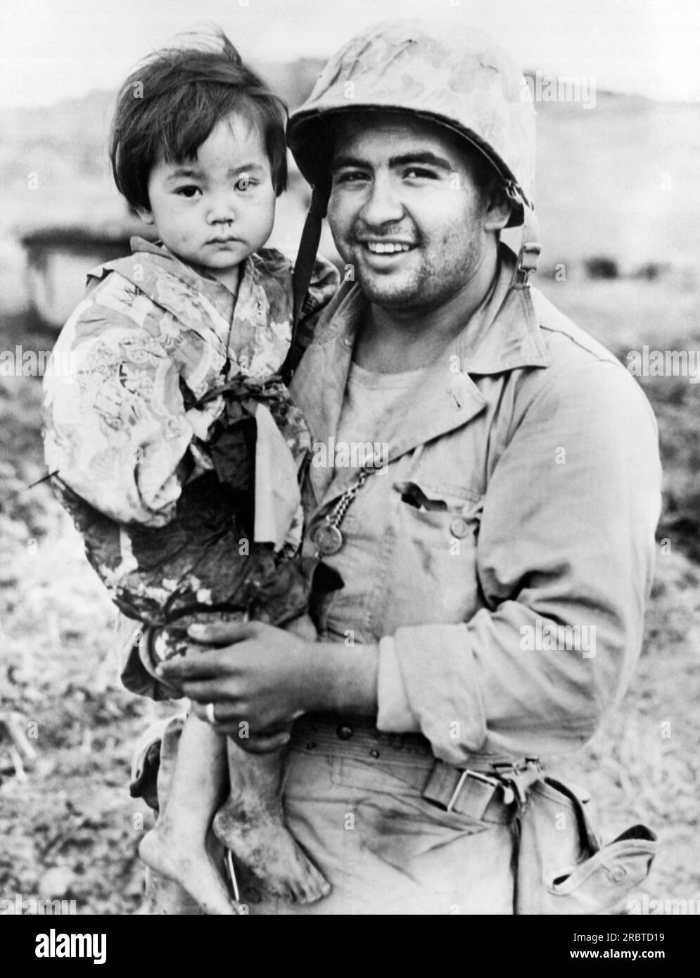 Okinawa, Japan: May 21, 1945 A Pharmacist's Mate attached to the First ...