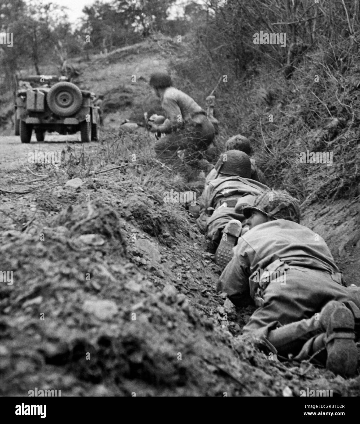 Saint-Lo, France, July 24, 1944 American soldiers inch forward in their ...