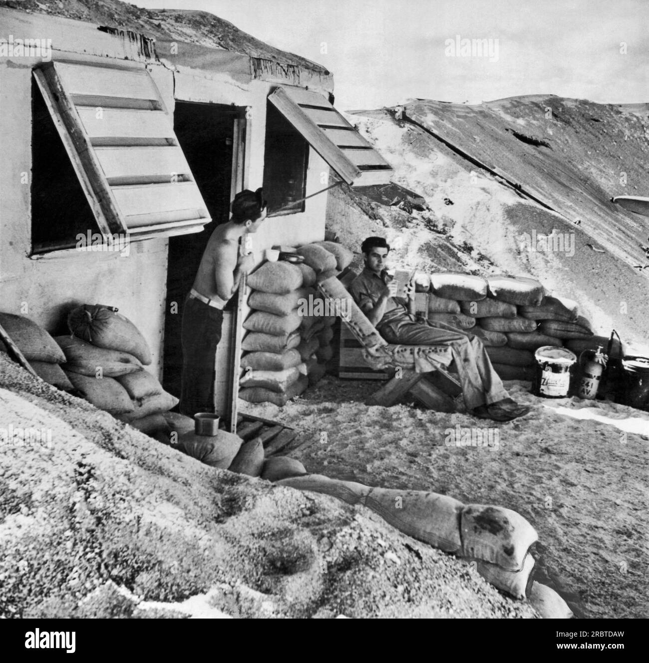 Midway Island, Pacific Ocean: November 2, 1942 Two Marines make the ...