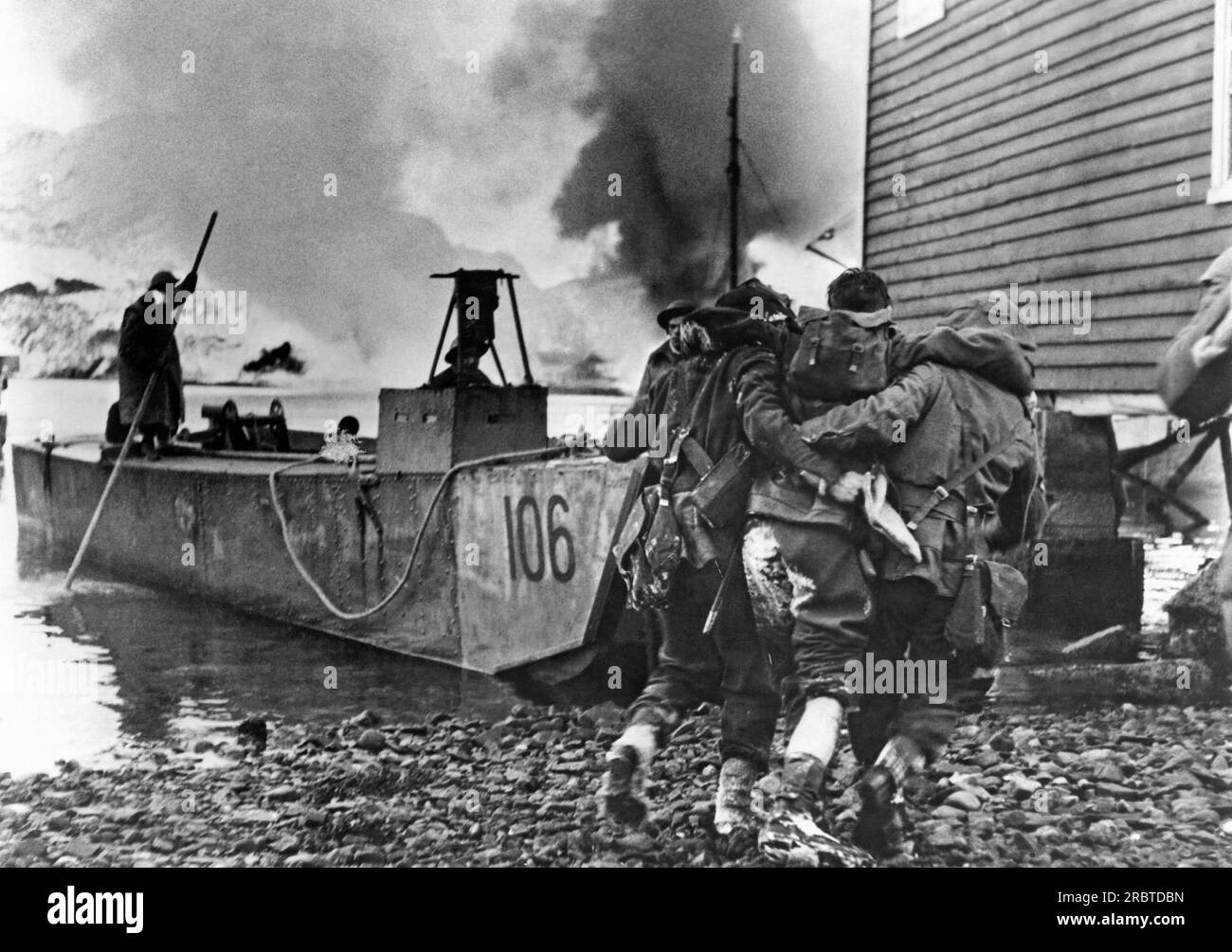 Vaagso, Norway: December 27, 1941. A wounded British Commando is being ...