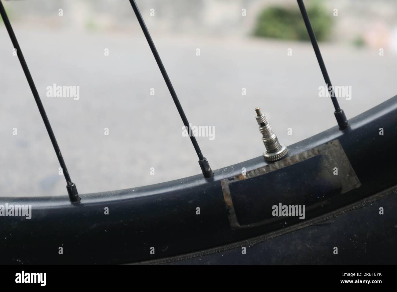 valve cap. wheel inflation valve on a bicycle Stock Photo - Alamy