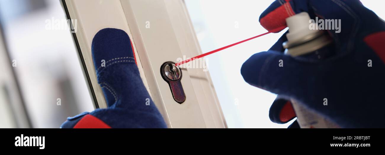 Man fixing lock front door hi-res stock photography and images - Alamy