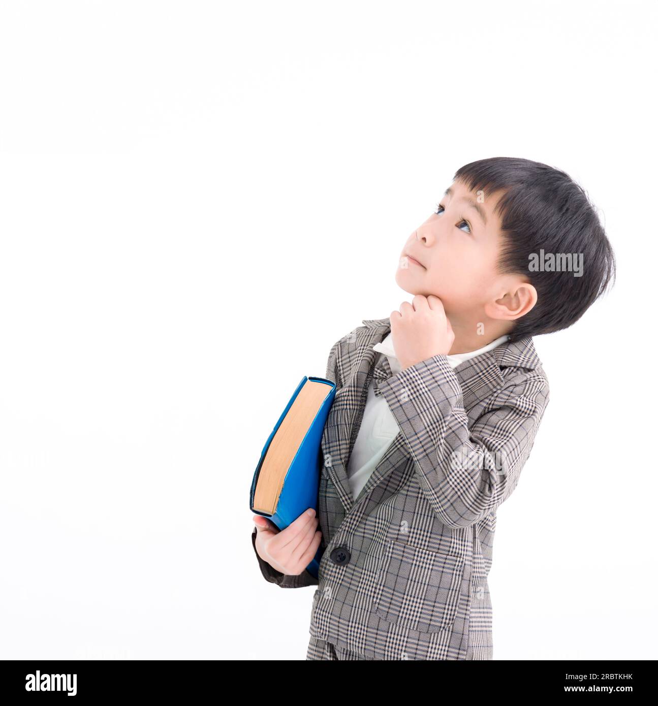 Let me think., child schoolboy thinking and doubting, making choice ...