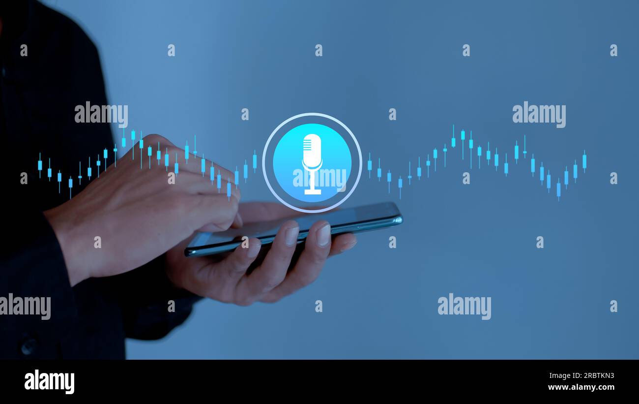 Hand-holding smartphone with microphone icon on virtual screen. Speech ...