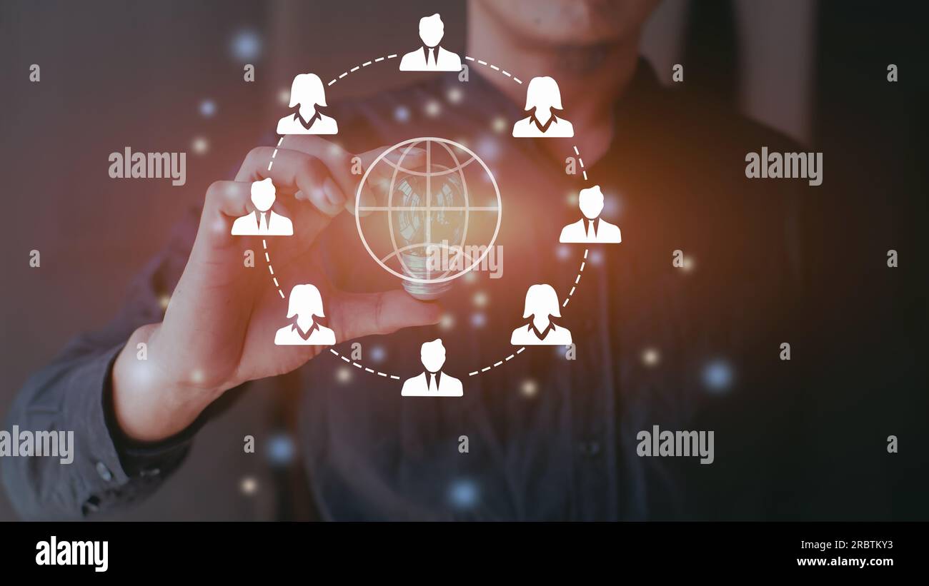 Businessman showing a virtual human icon on a light bulb. Customer ...