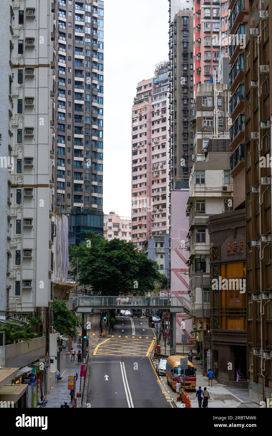 Bustling street roads and high-rise buildings in Hong Kong Stock Photo - Alamy