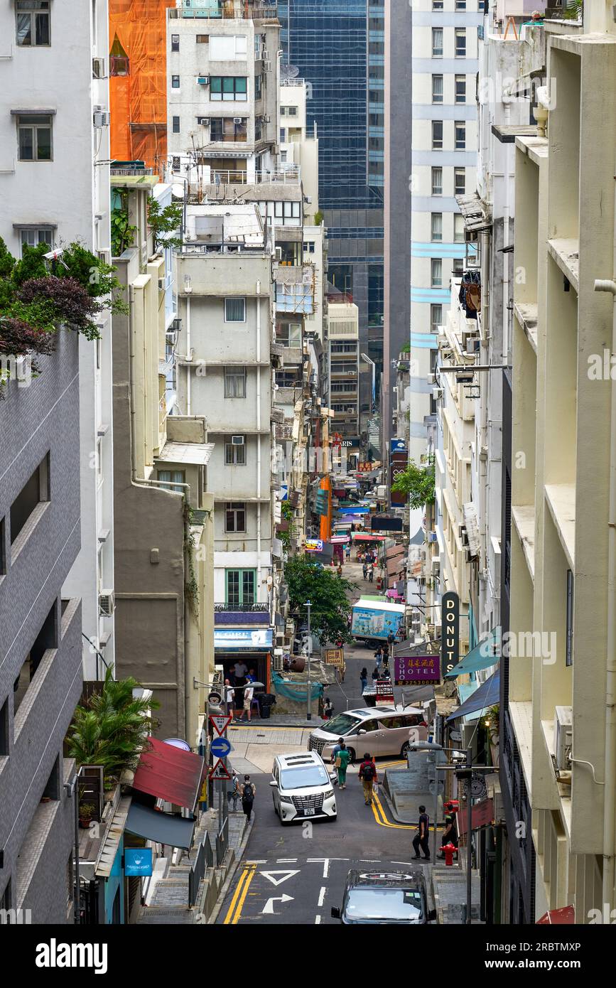 Bustling street roads and high-rise buildings in Hong Kong Stock Photo - Alamy