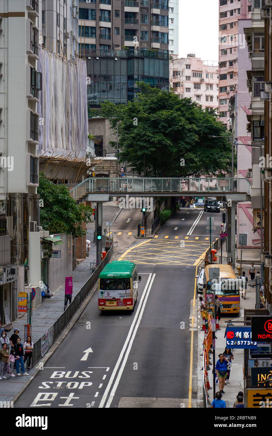 Bustling street roads and high-rise buildings in Hong Kong Stock Photo - Alamy