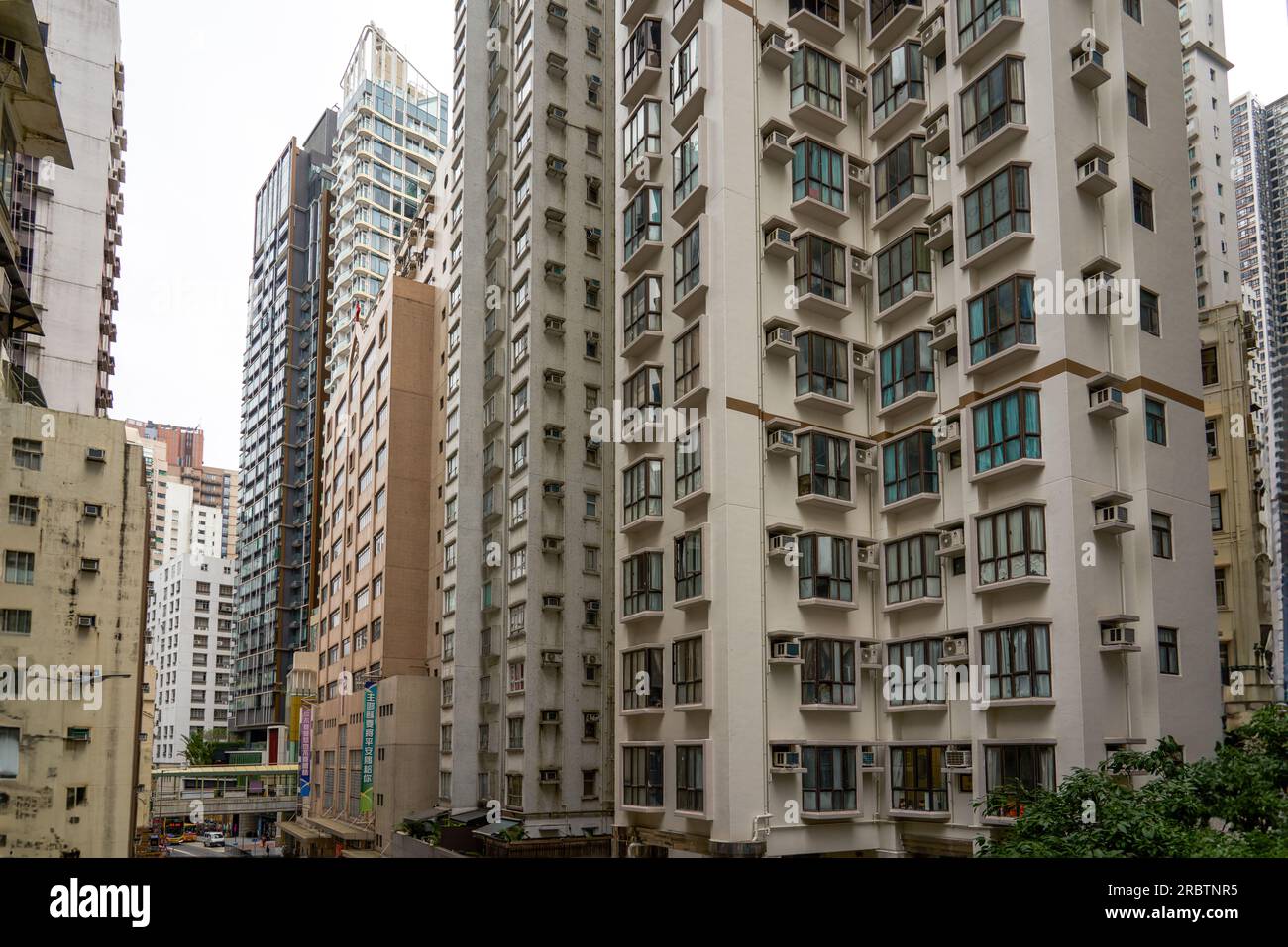 Bustling street roads and high-rise buildings in Hong Kong Stock Photo - Alamy