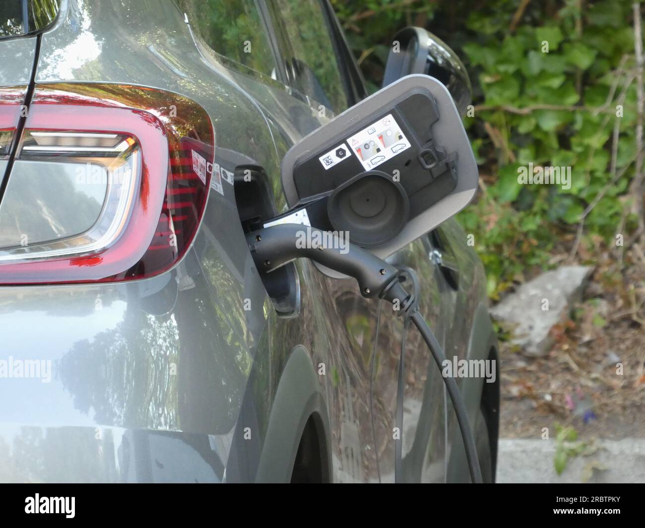 Cologne, Germany. 08th July, 2023. An electric car is charged at a ...
