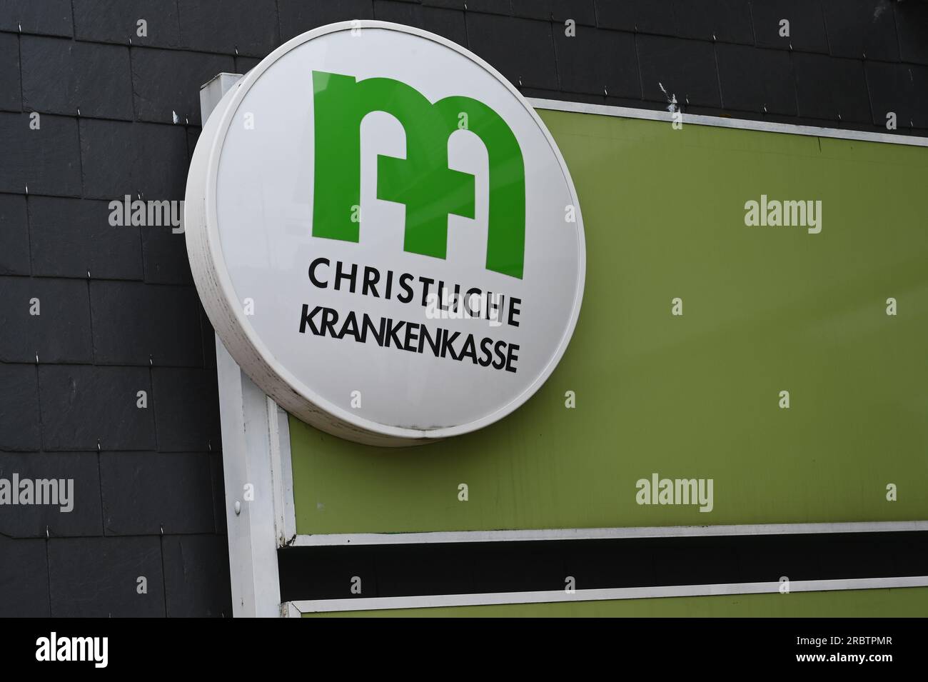 02 July 2023, Belgium, Büllingen: Sign with logo and lettering of CKK ...