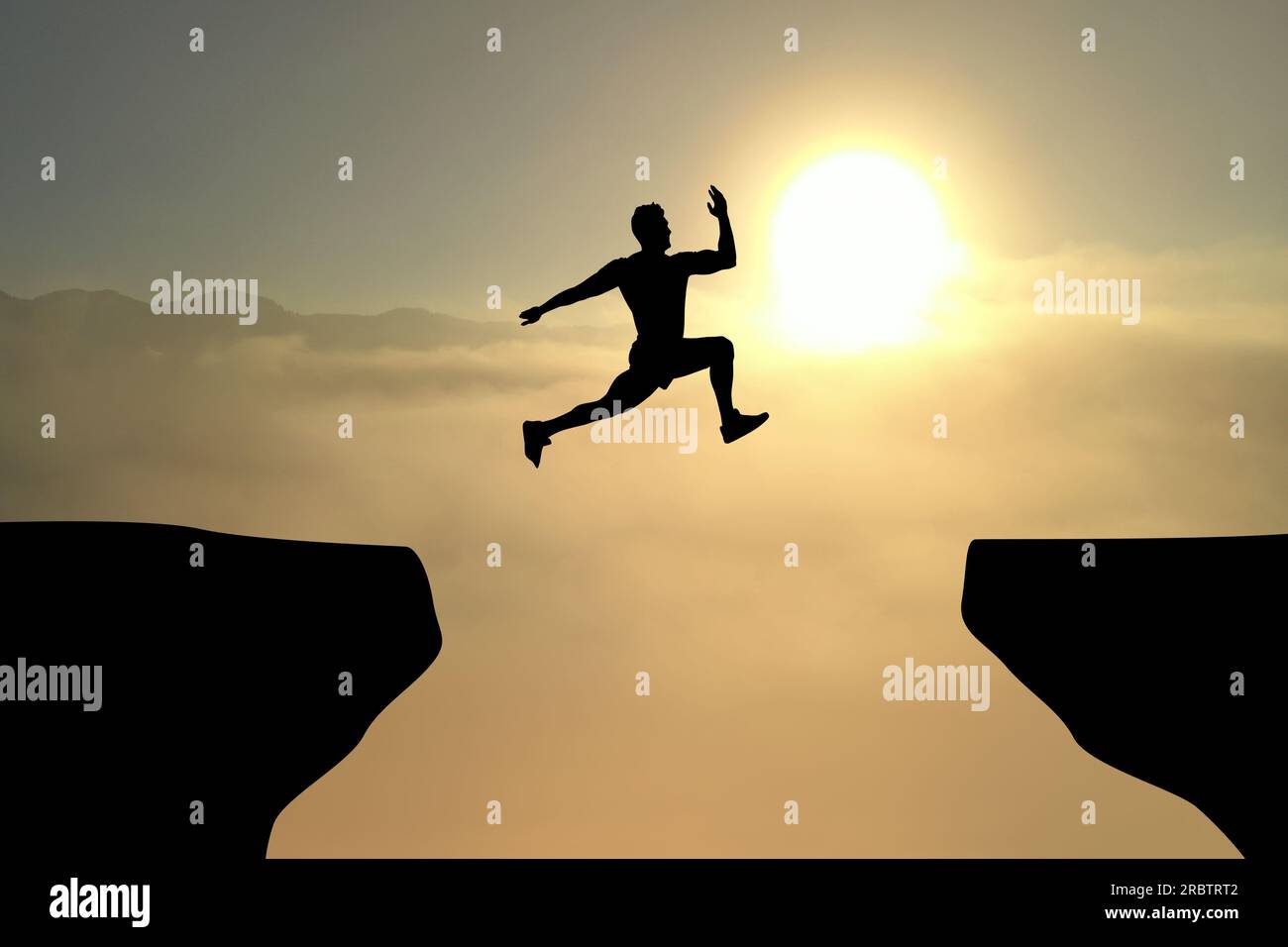 Concept of reaching life and business goals. Silhouette of man jumping ...