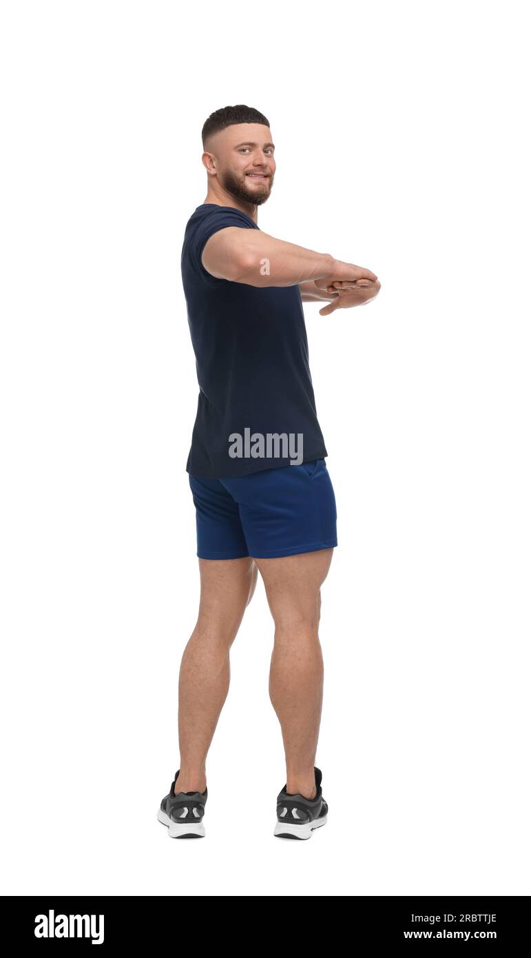 Happy man doing morning exercise on white background Stock Photo - Alamy