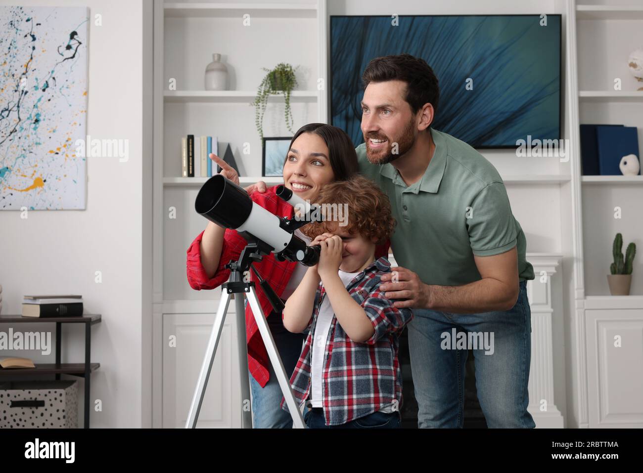 Young family in science hi-res stock photography and images - Alamy
