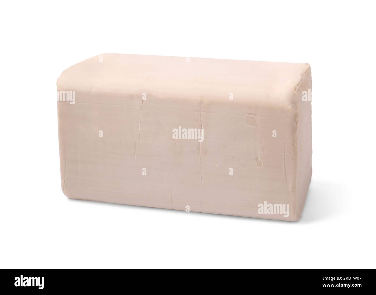 Block of compressed yeast isolated on white Stock Photo - Alamy