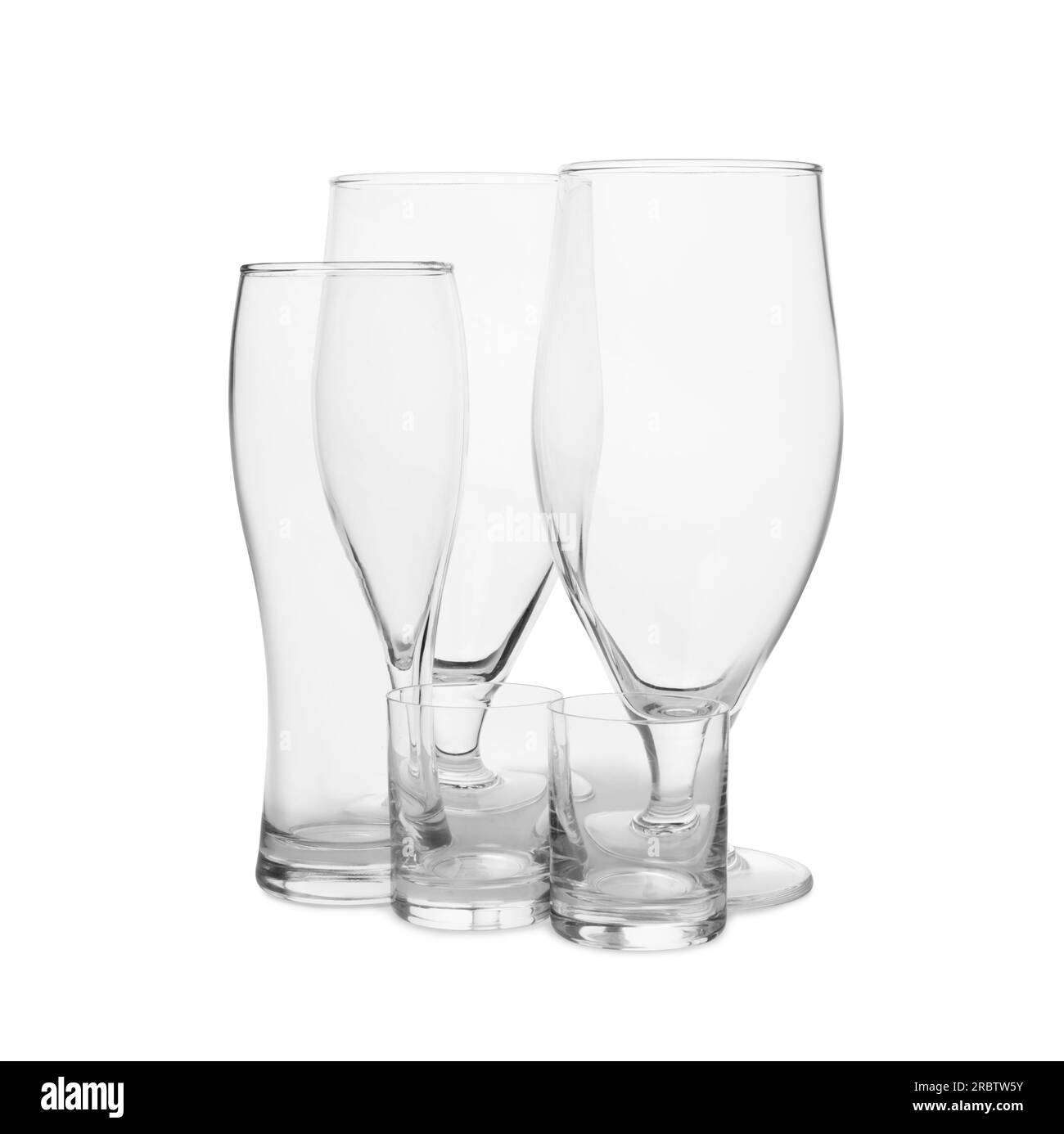 Different elegant empty glasses isolated on white Stock Photo - Alamy