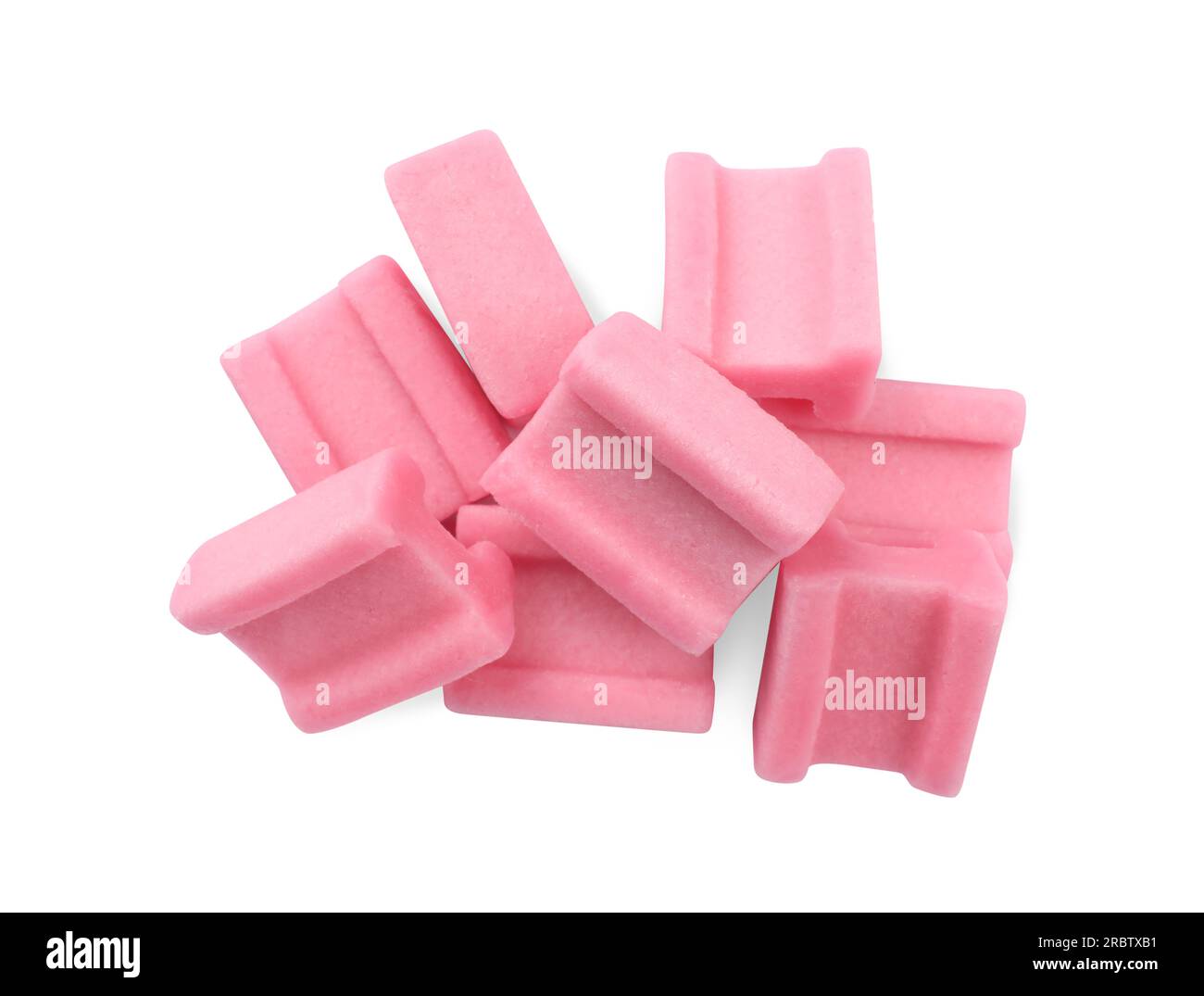 Tasty pink chewing gums on white background, top view Stock Photo - Alamy