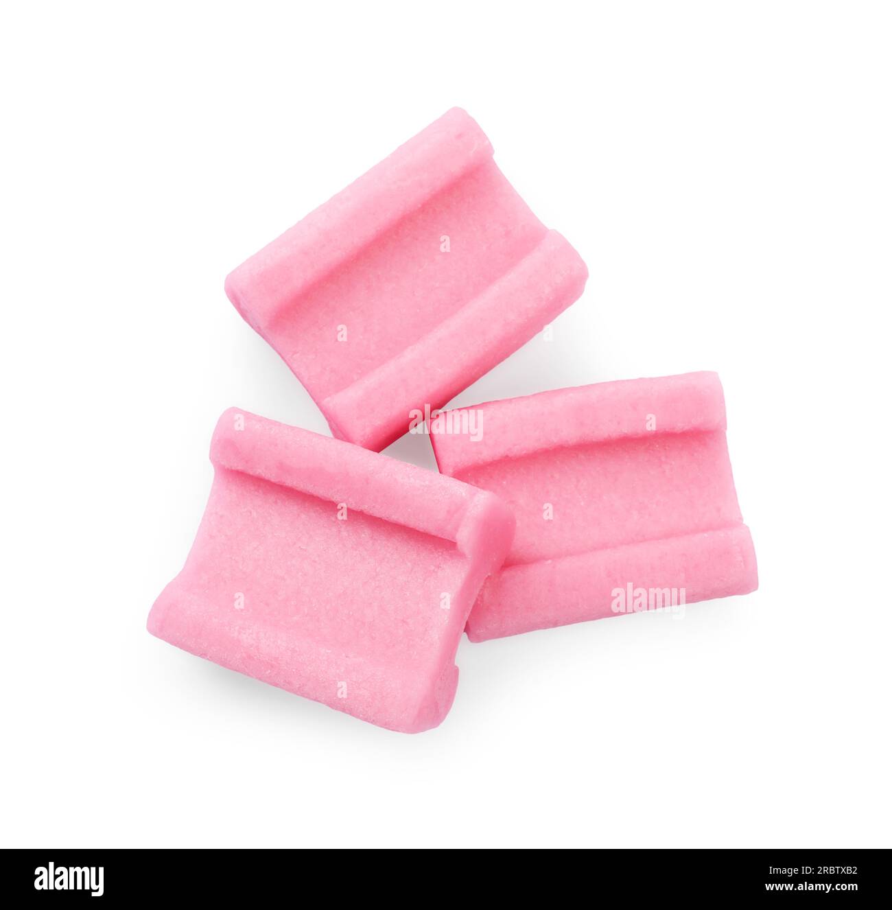 Tasty pink chewing gums on white background, top view Stock Photo - Alamy