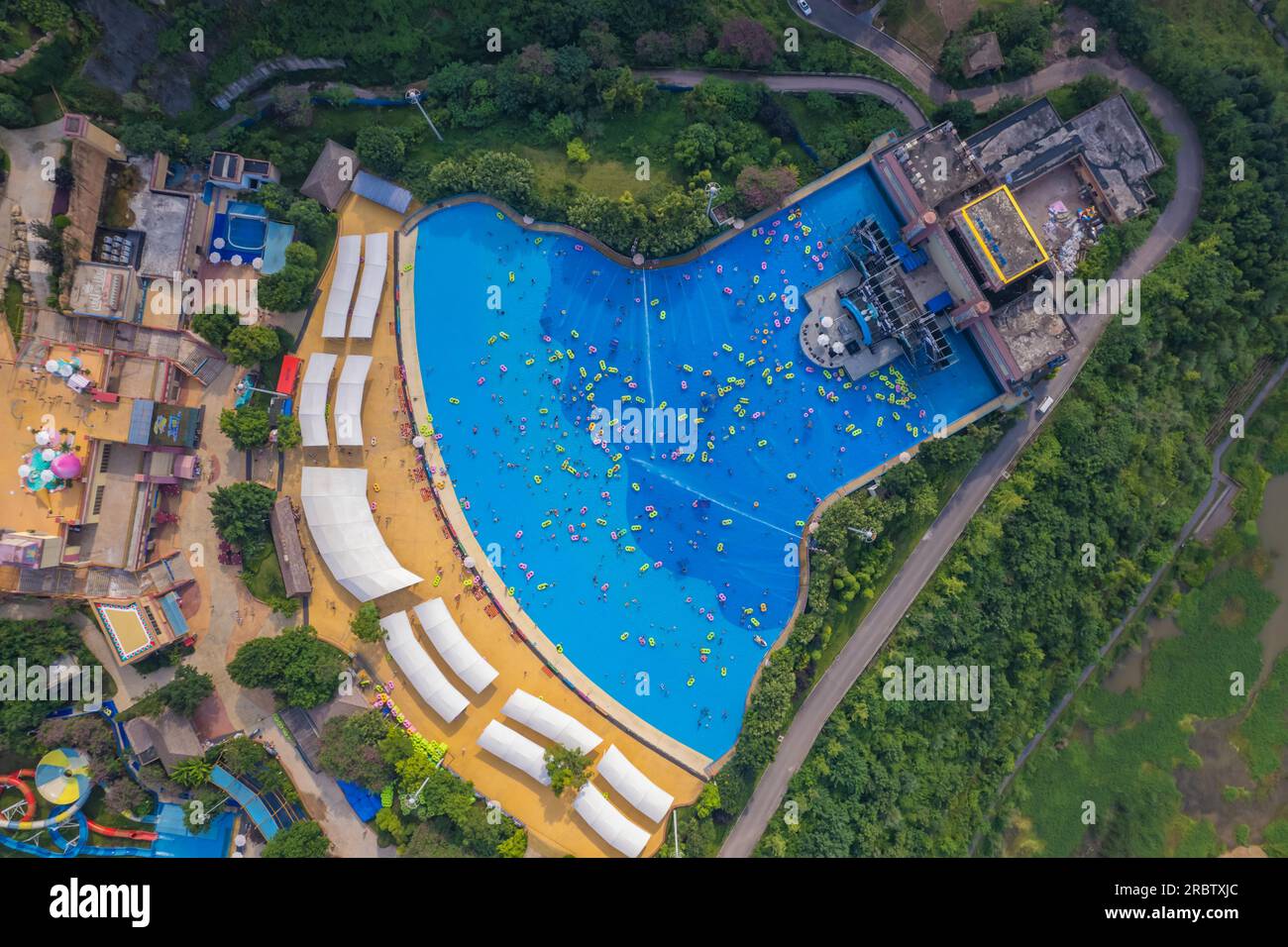 Aerial photo shows people swimming at a water park in Chongqing, China ...