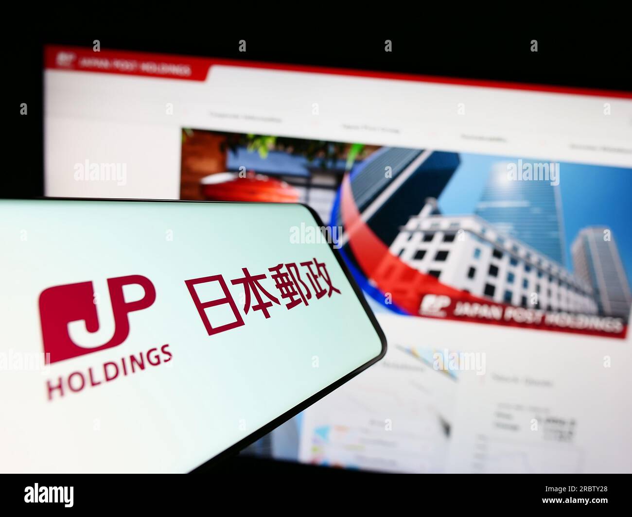 Smartphone with logo of Japanese company Japan Post Holdings Co. Ltd ...