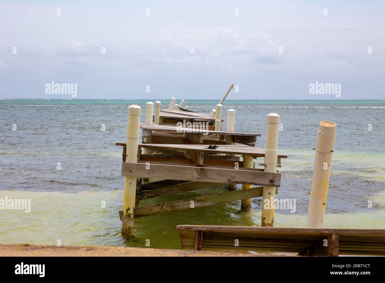 Destroyed Pier after a Hurricane in the caribbean Stock Photo - Alamy