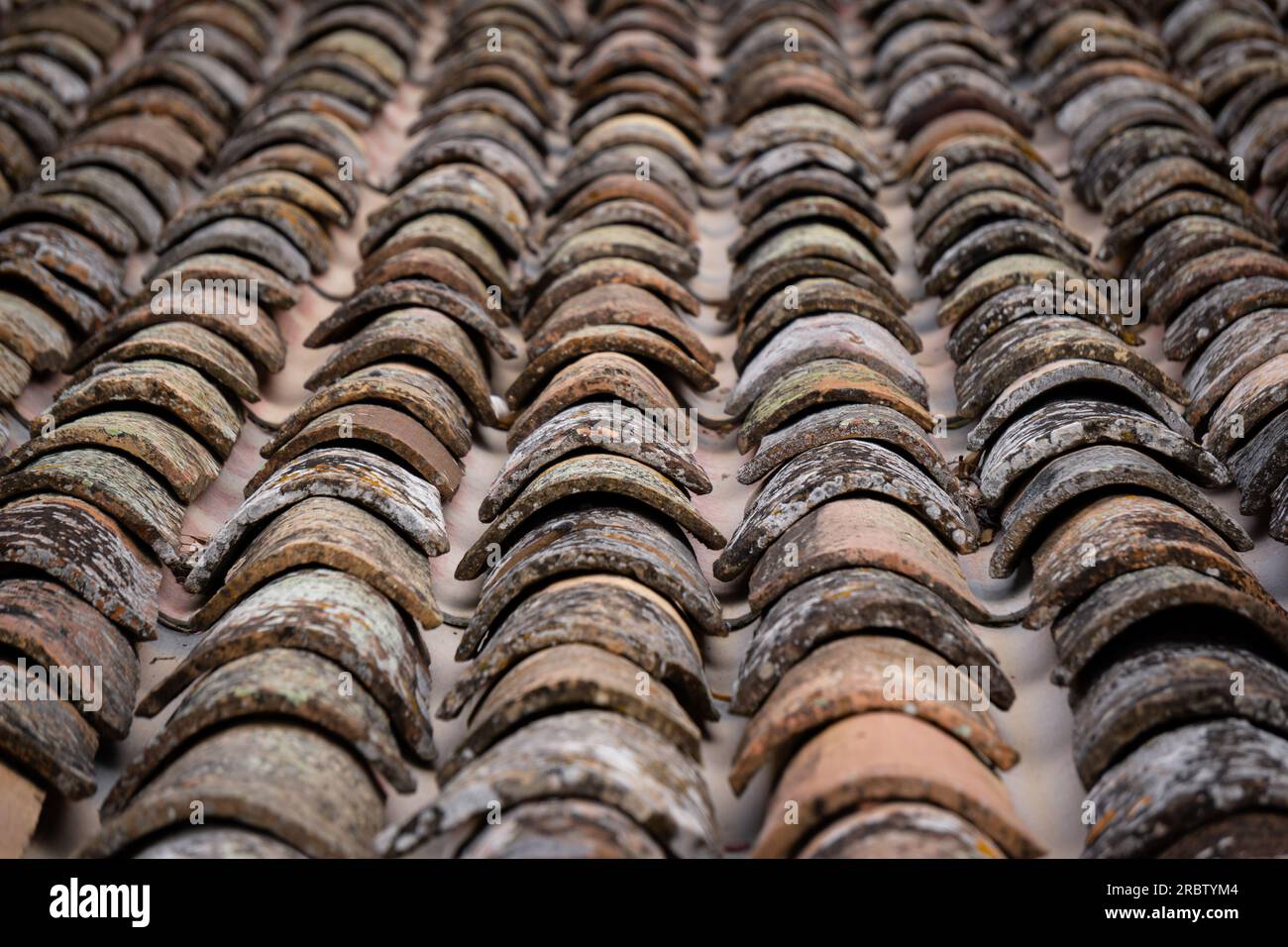 Close-up image of the roof of a building covered with old tiles Stock ...