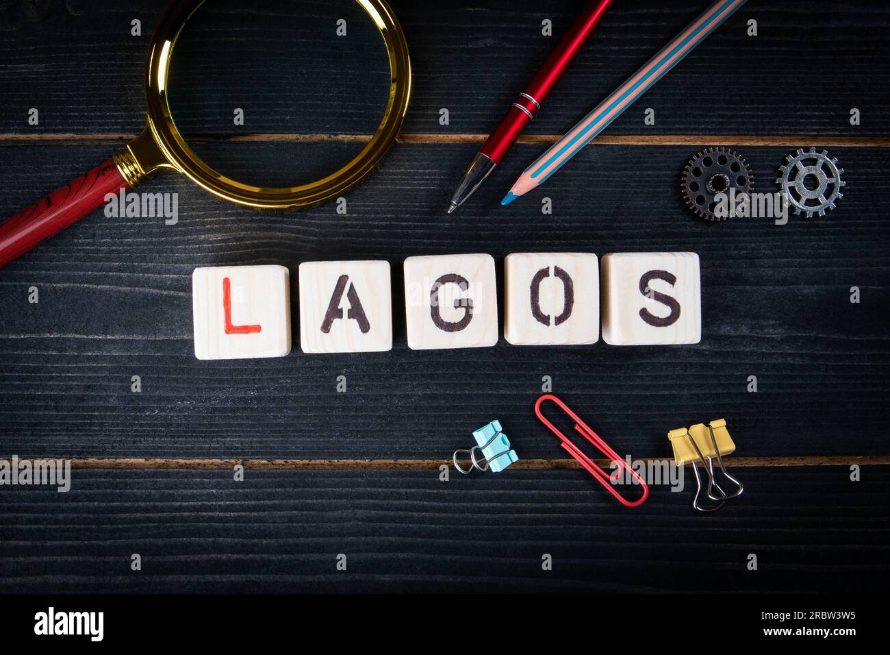 LAGOS. City name from blocks on a dark wood texture background Stock ...